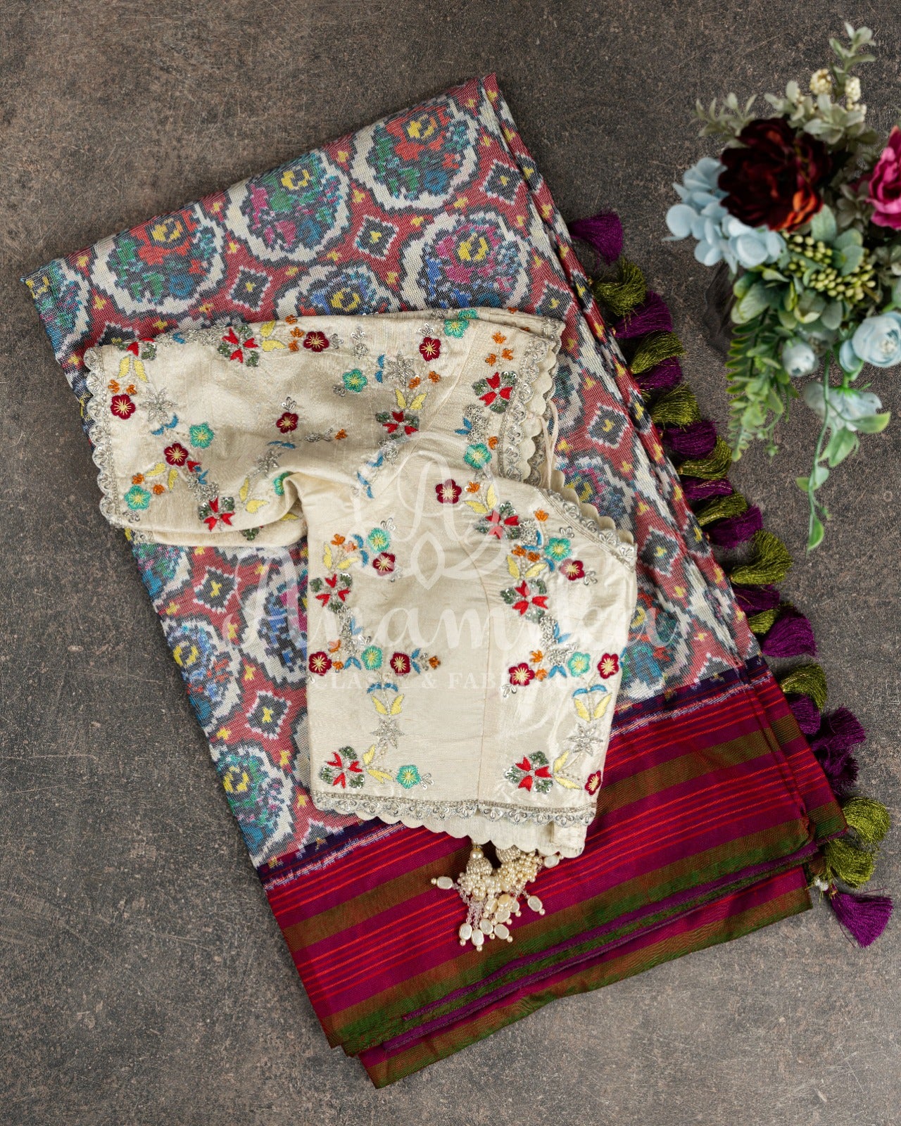 Twill Patola Saree in cream color paired with a cream multi color thre ...
