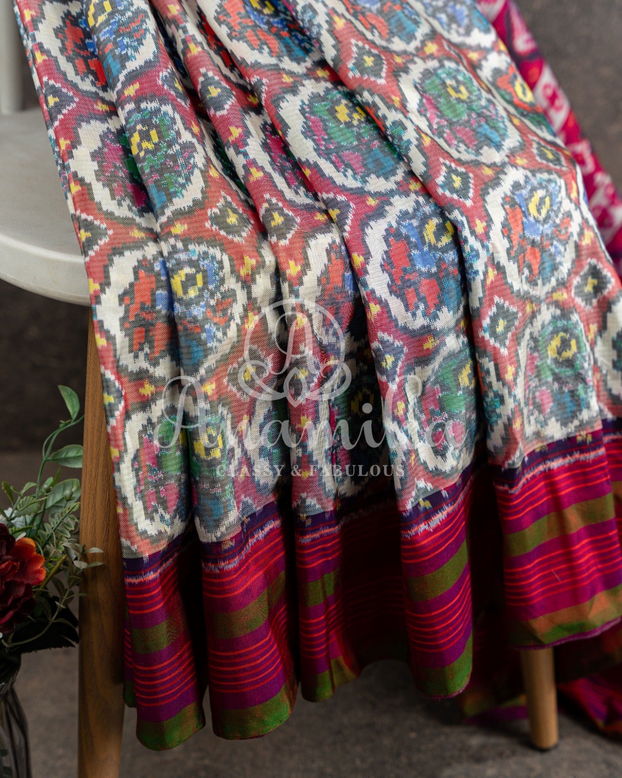 Twill Patola Saree in cream color paired with a cream multi color thre ...