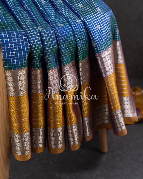 Copper Sulphate Blue Venkatagiri pattu saree with a contrast yellow bl ...
